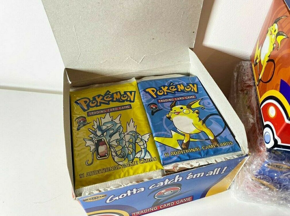 Real vs Fake Booster Pack Comparison & More - Articles - Elite Fourum